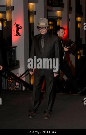 Andrew Levitas, Johnny Depp and Minami attending the Minamata Premiere ...