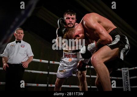 TAUNTON, UNITED KINGDOM. 21 Feb 2020. Yeovil boxer Dean Dodge (black ...