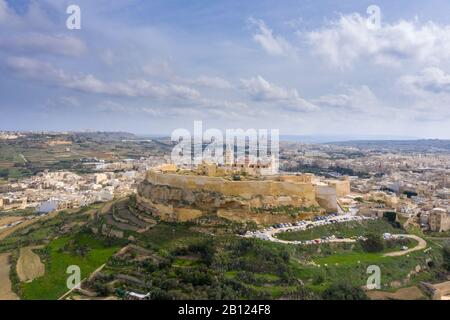 Aerial drone photo - The Gozo Citadel at sunset. A medieval fortress in ...
