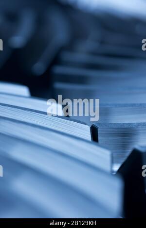 Three cog wheels working together in an engine Stock Photo - Alamy