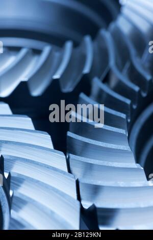 Three cog wheels working together in an engine Stock Photo - Alamy