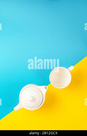 Blue and white cup pot with black coffee americano on wooden table in ...