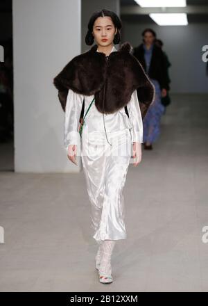 Models on the Yuhan Wang catwalk during the Fashion East Autumn/Winter ...