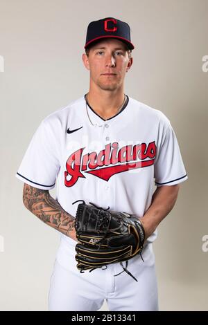 Cleveland Indians pitcher Zach Plesac (65) pitches against the Texas Rangers during a MLB ...