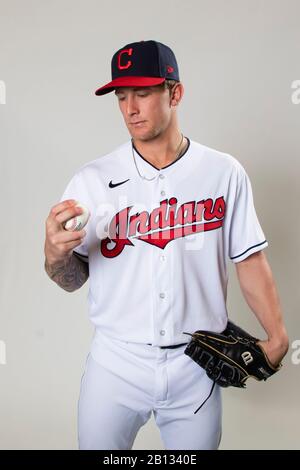 Cleveland Indians pitcher Zach Plesac (65) pitches against the Texas Rangers during a MLB ...