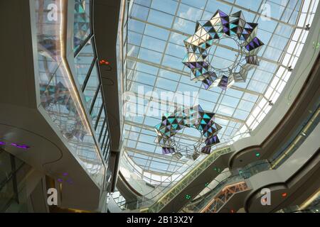 The interior structure of a Chinese mall, transparent glass ceiling ...