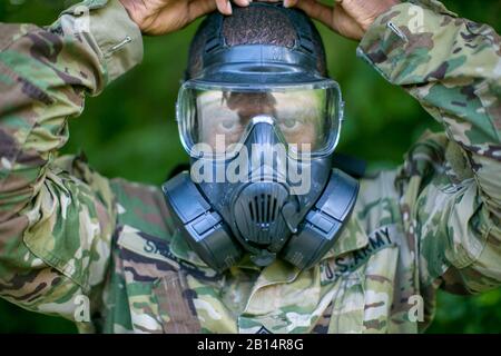 A U.S. Marine assigned to Chemical Biological Radiological and Nuclear ...
