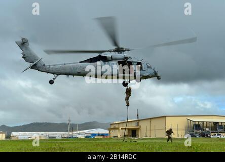 A U.S. Navy Sailor assigned to Explosive Ordnance Disposal Group One ...