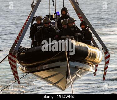 US Navy A boarding team member aboard the U.S. Coast Guard Cutter Adak ...