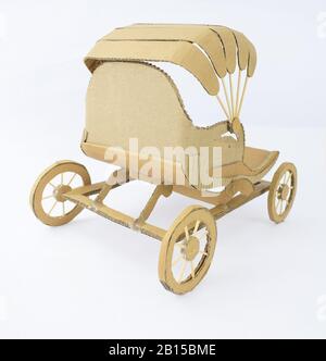 Back view of a handmade carriage made of different colored cardboard ...