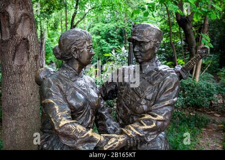 Bronze sculpture showing Chinese Communist soldiers and civilians in ...