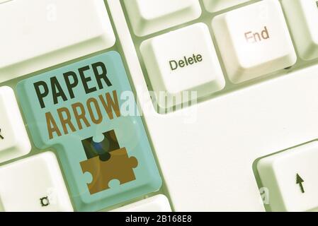Writing note showing Paper Arrow. Business concept for Business ...