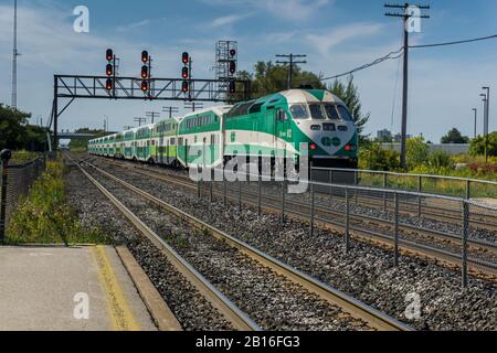 GO Train commuter railroad cars lined up on downtown Toronto tracks ...