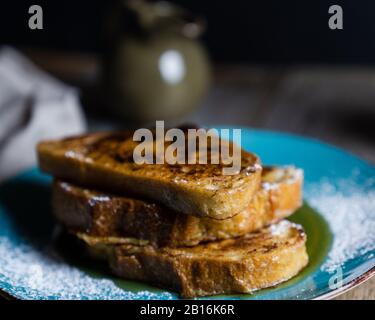 Home made french toast on a rustic surface Stock Photo - Alamy
