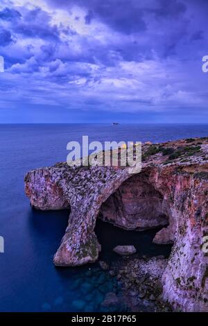 The Blue Grotto of Malta, rock formation on the sea with crystal clear ...
