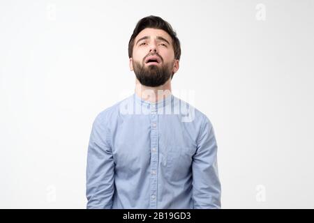 Sad crying man whining, pointing fingers down disappointed, showing bad ...