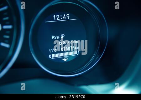 Dashboard and display of a modern car, average fuel consumption ...