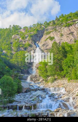 The particular waterfall of Noasca in Piedmont/ Italy is located behind ...