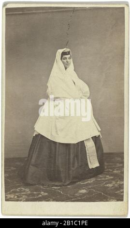 Full-length portrait of Georgian woman, facing slightly right, between ...