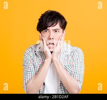 Portrait of asian man surprised with confused and displeased expression ...