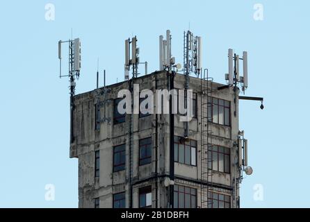 Densely mounted multiple cell phone transmitters and antennas on strong ...