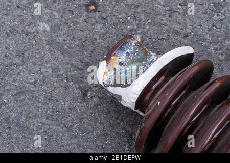 The insulator defective due to short circuit of the high voltage. As a ...