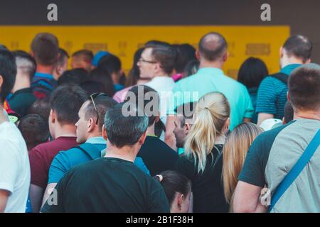 People stand in line at check-in counters at El Paso National Airport ...