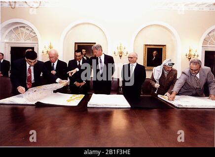 Israeli and Palestinian leaders sign the maps that were part of the ...
