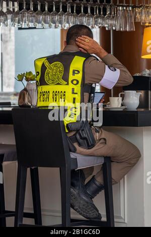 Police officer, policeman with a cup of hot drink, tea of coffee Stock ...