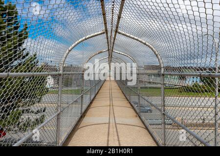 concrete walkway, chain link fence Stock Photo - Alamy