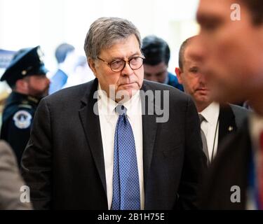Attorney General William Barr leaves his home, Friday, Feb. 21, 2020 ...