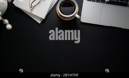 Overhead shot of a study table with notebooks, pencils, coffee and copy ...
