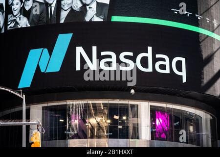 A logo of the Nasdaq Stock Market seen in Midtown Manhattan. (Photo by ...