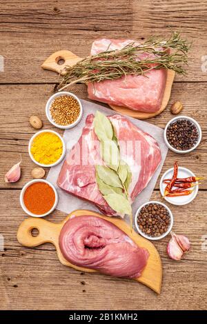 Raw Shoulder Top Blade cuts, beef meat steaks. Brown background. Top ...