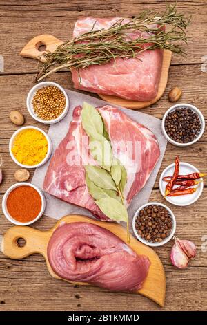 Raw Shoulder Top Blade cuts, beef meat steaks. Brown background. Top ...
