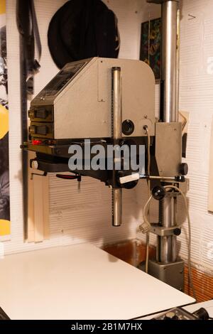 Vintage enlarger for printing black and white photo isolated on white ...