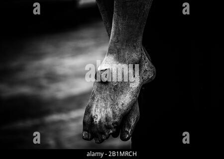 Jesus on the cross the crucifixion feet and toes detail Stock Photo - Alamy