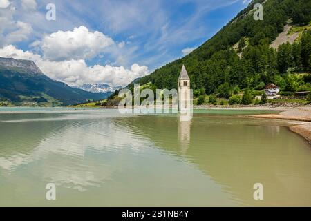 The bell tower in Reschensee, Lago di Resia, Lake Reschen, South Tyrol ...
