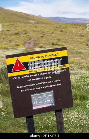 A warning sign about Puma in Torres del Paine national Park, Patagonia ...