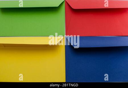 Red and green envelopes on color background Stock Photo - Alamy