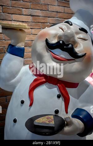 Statue of an Italian chef advertising a Pizzeria restaurant Stock Photo ...