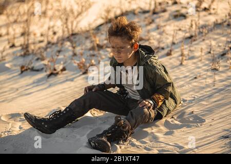Young boy playing dead on the floor Stock Photo - Alamy