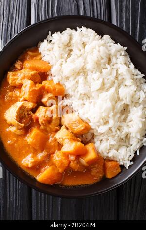 Gambian Domoda meat in peanut sauce served with rice in a dish on the ...