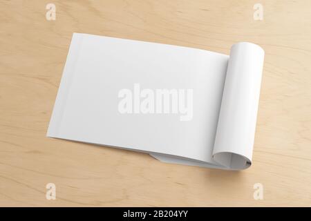 Blank horizontal left magazine page. Workspace with folded magazine ...