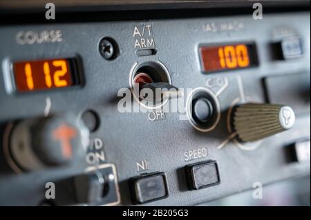 Switches and displays on mode control panel of Boeing 737 airplane ...