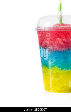 Colorful slushie of differents flavors on yellow and blue background ...