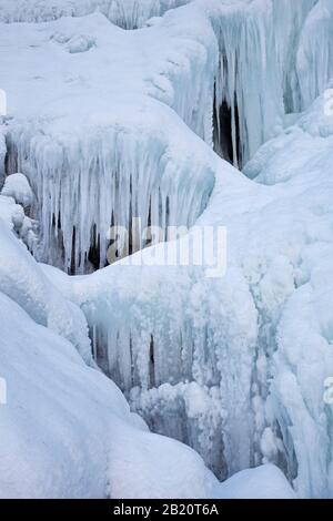 Icicles on a waterfall Stock Photo - Alamy