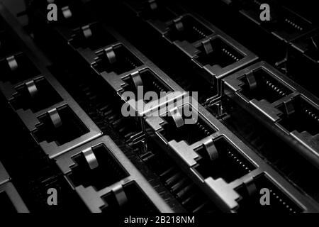 Isolated close up of closely aligned multiple through hole assembly ...