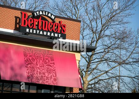 A logo sign outside of Bertucci's restaurant location in Baltimore ...