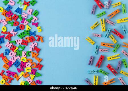 blue wooden background with multicolored wooden letters Stock Photo - Alamy